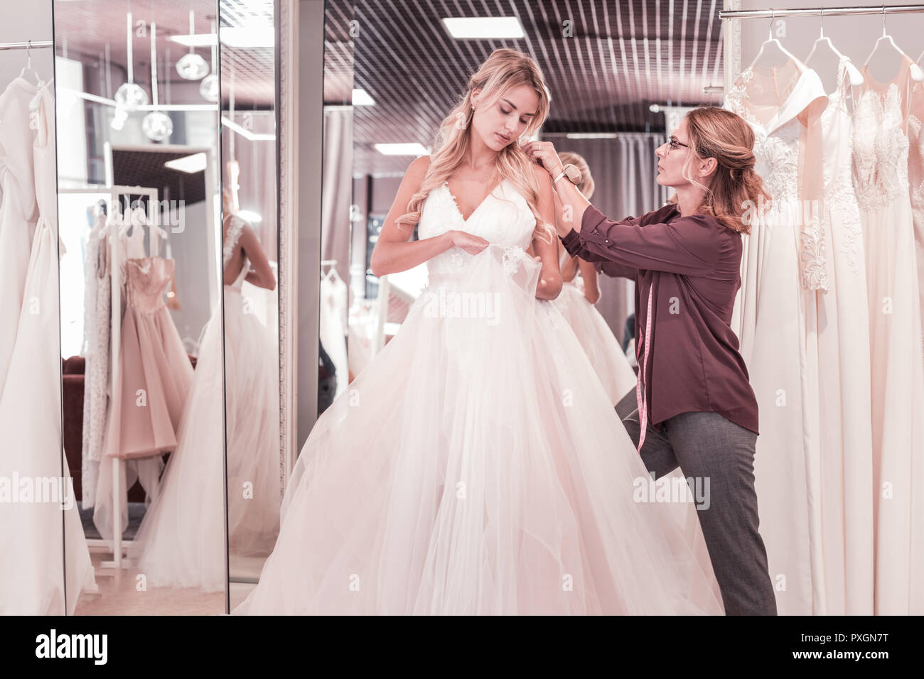 Fixing bride hi-res stock photography and images - Alamy