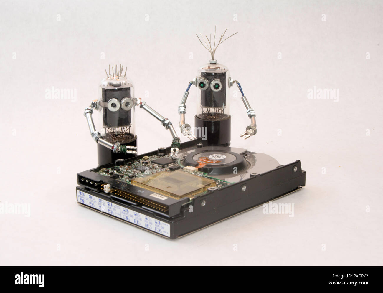 Robots repair hard drive Stock Photo - Alamy