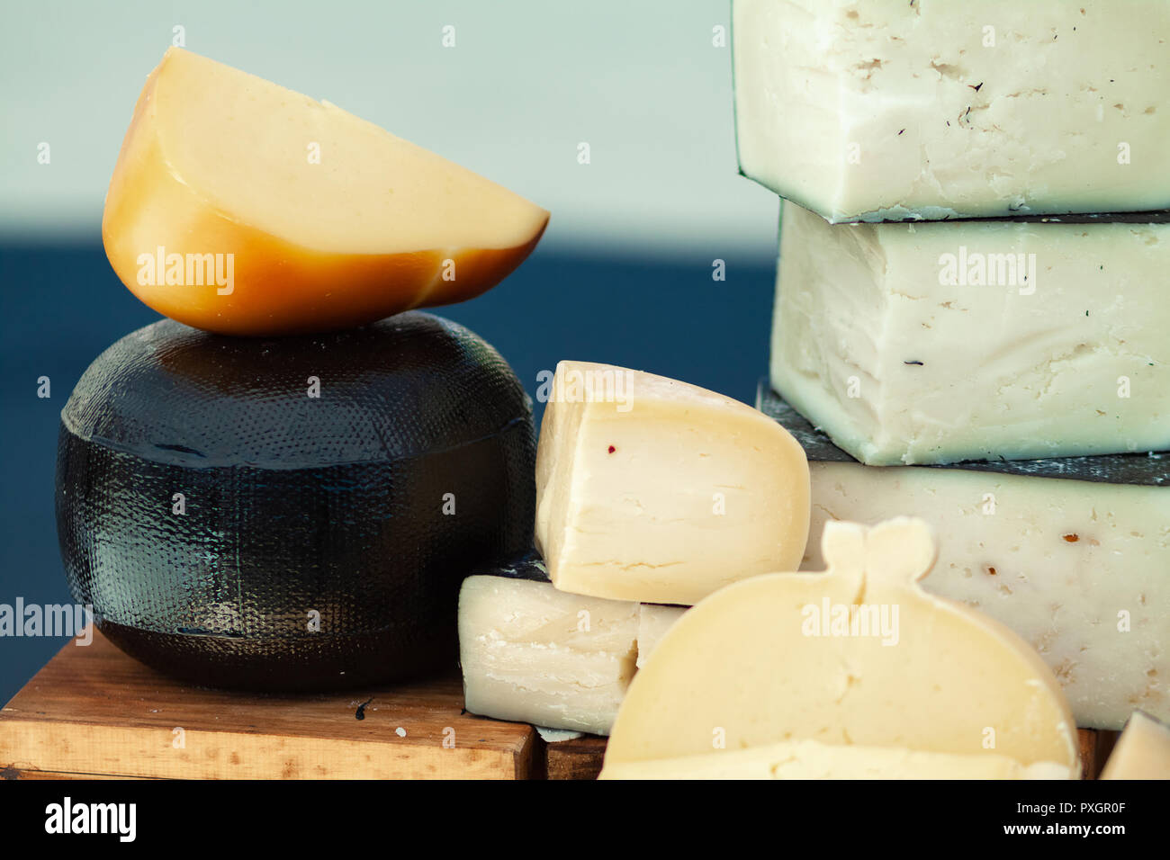 Organic homemade cheese at the cheese fair. Healthy food manufacture ...