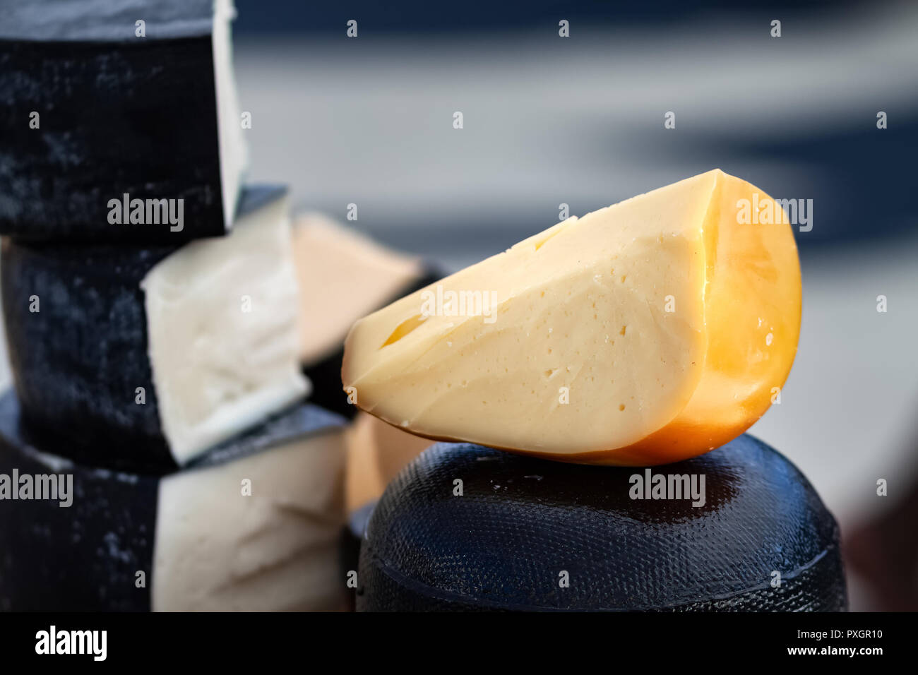 Organic homemade cheese at the cheese fair. Healthy food manufacture ...