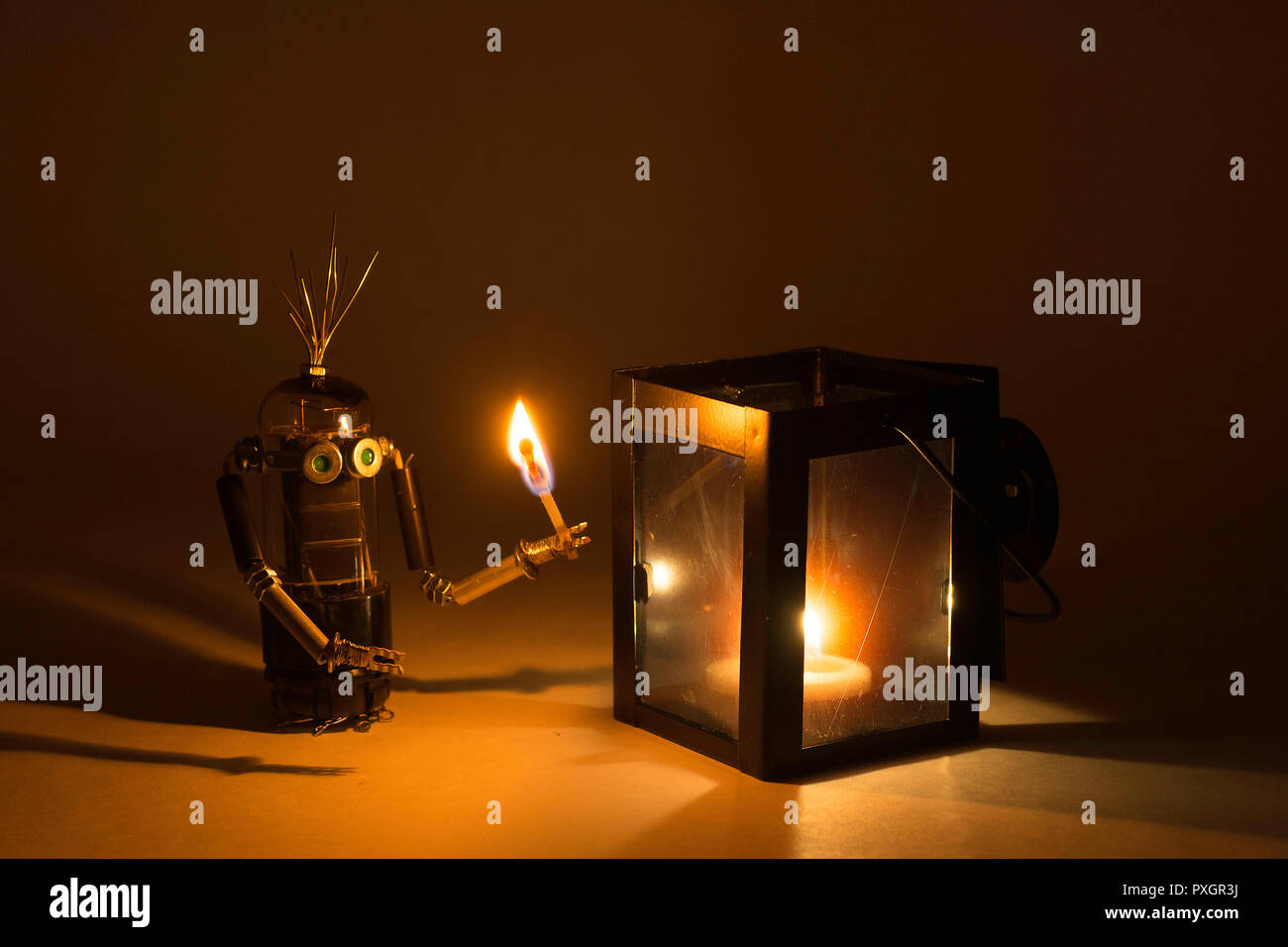 Robot playing with fire Stock Photo - Alamy