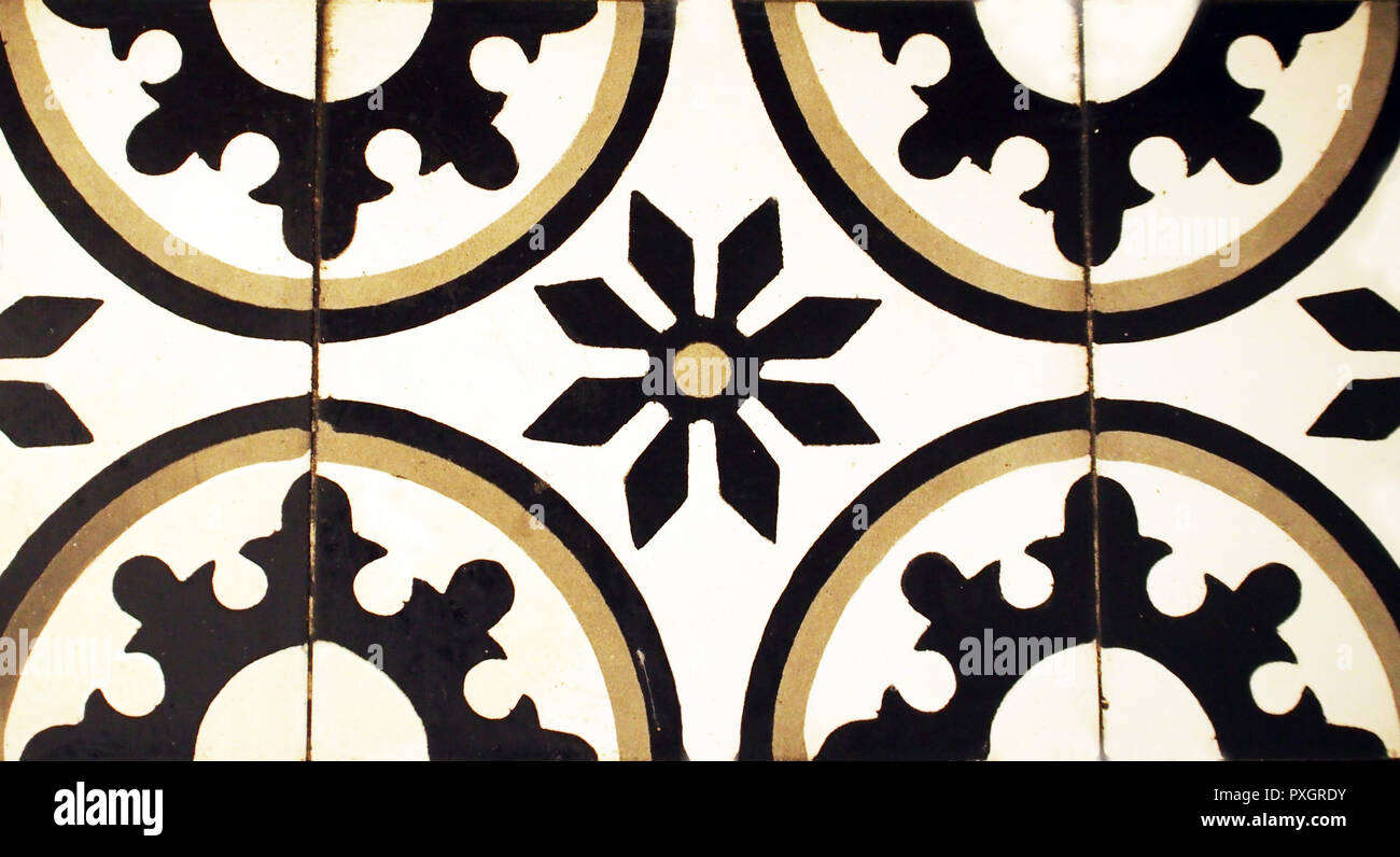 Detail of the traditional tiles from facade of old house. Decorative ...