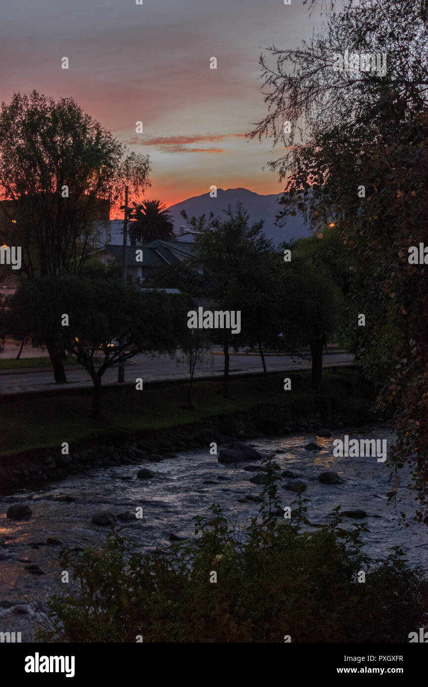 red sunset lighting the sky in cuenca, ecuador Stock Photo - Alamy