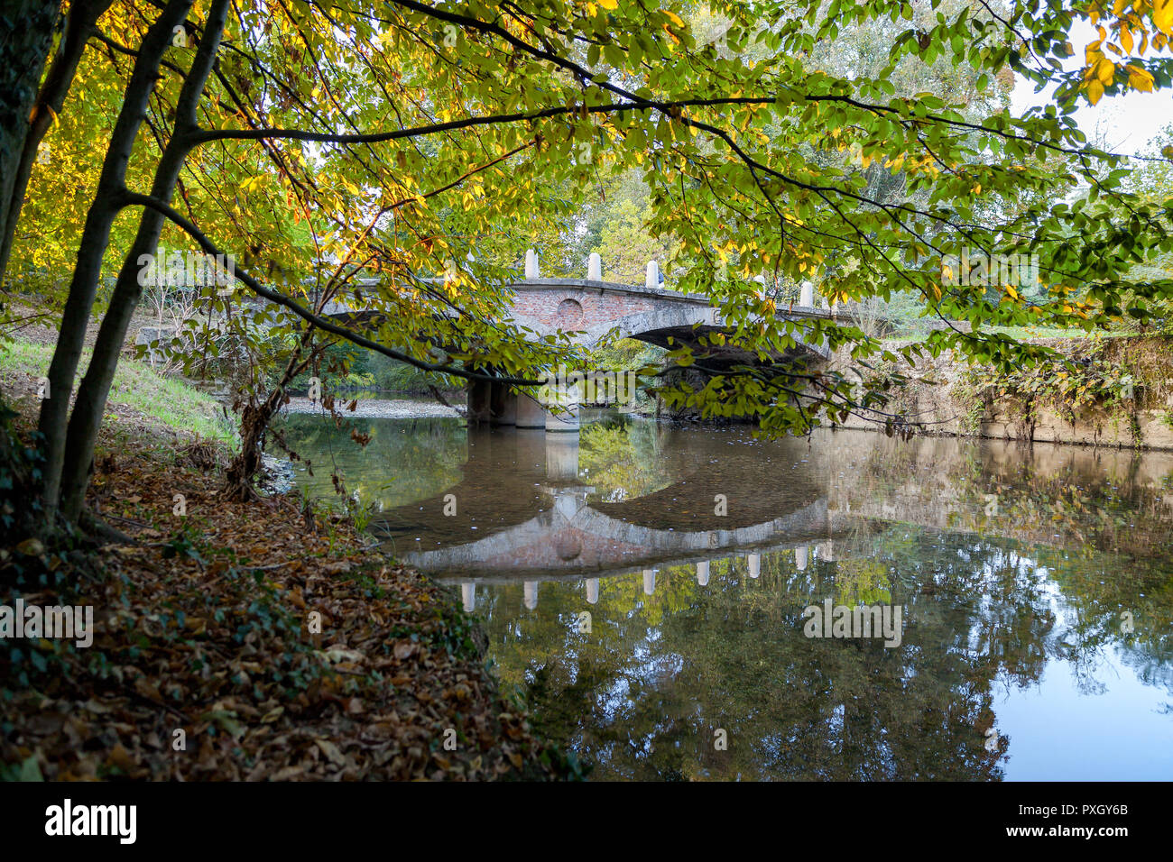 Ancient bridge of chains over lambro river in monza, shot in autumn ...