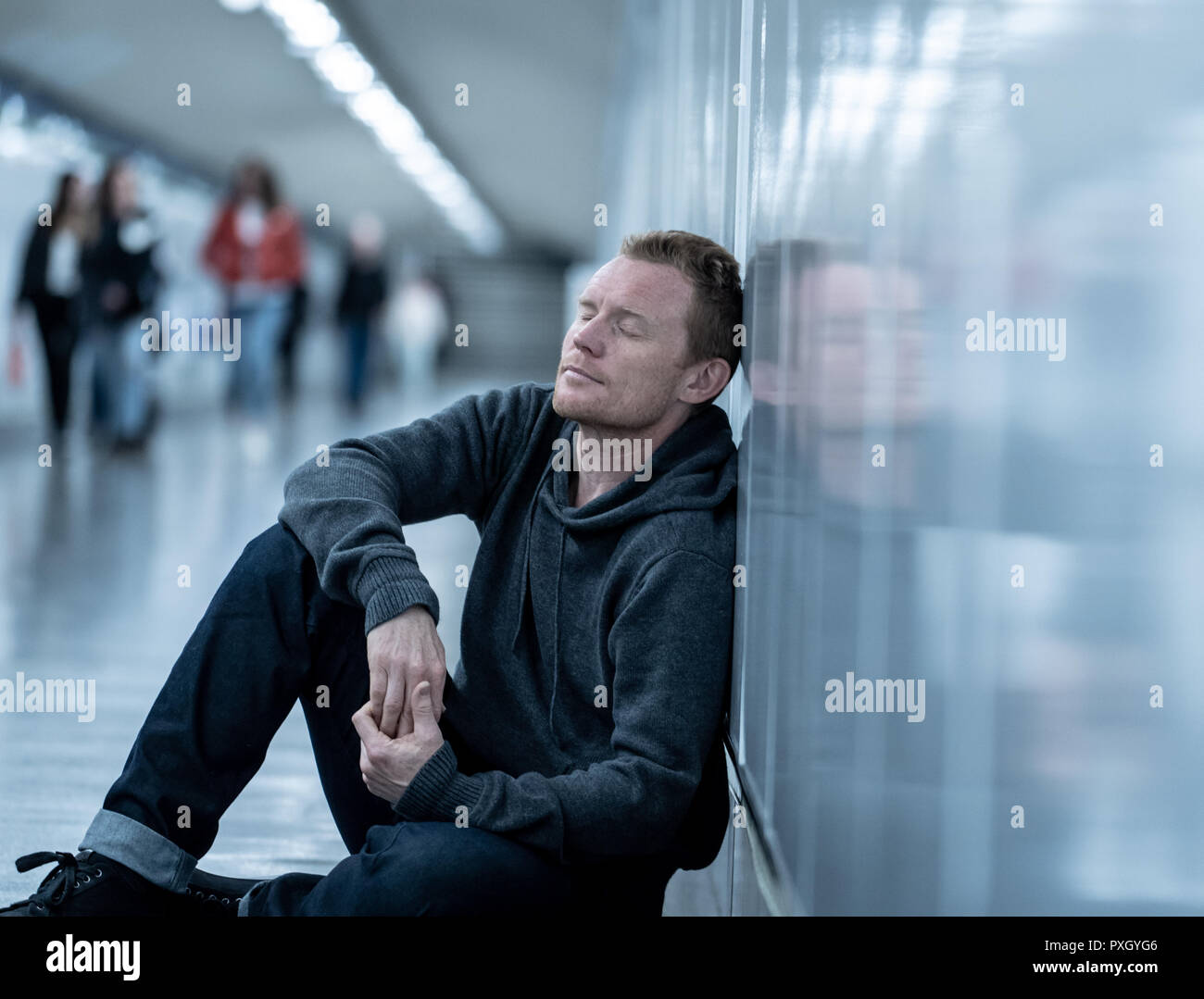 Miserable jobless young man crying Drug addict Homeless in depression ...