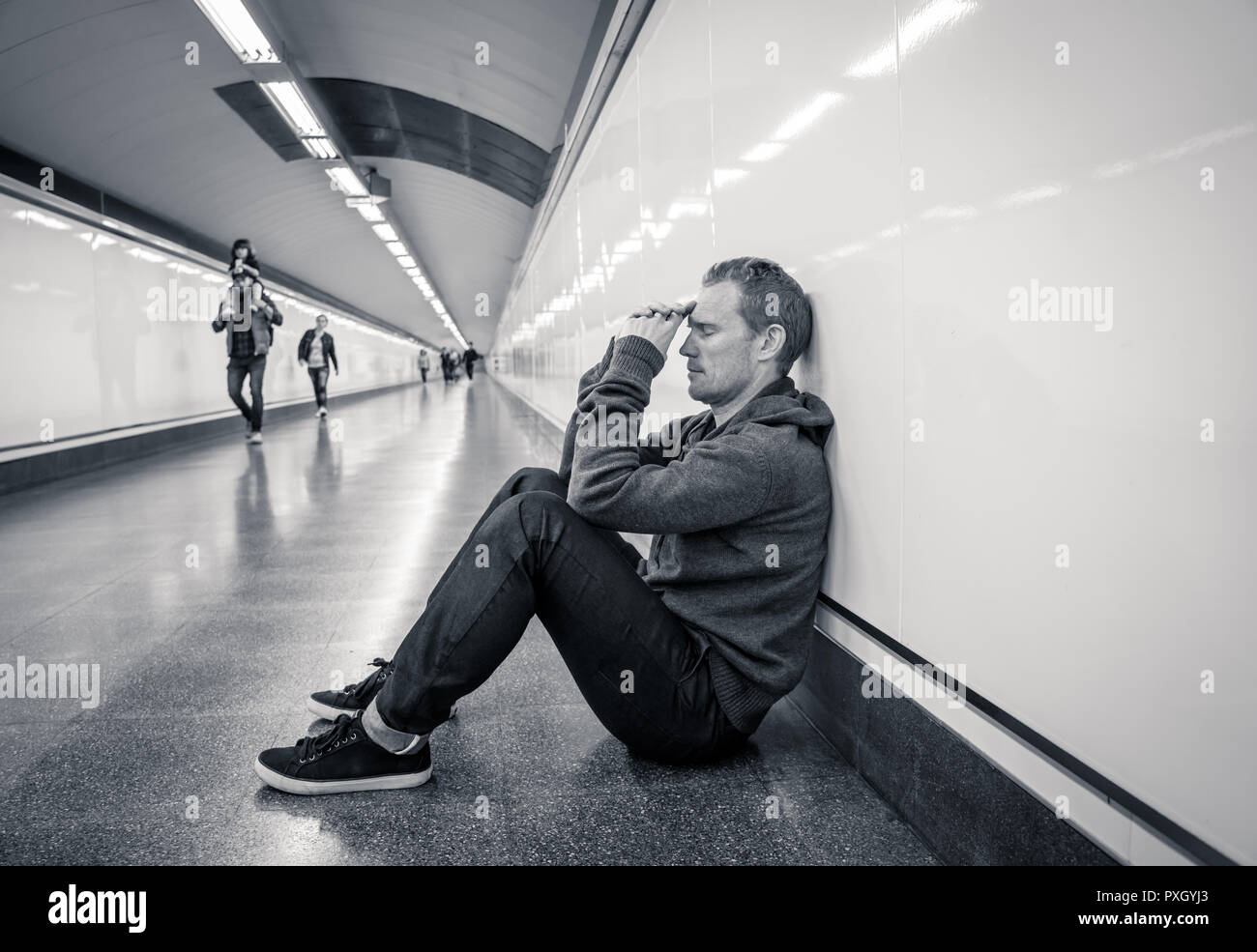 Miserable jobless young man crying Drug addict Homeless in depression ...