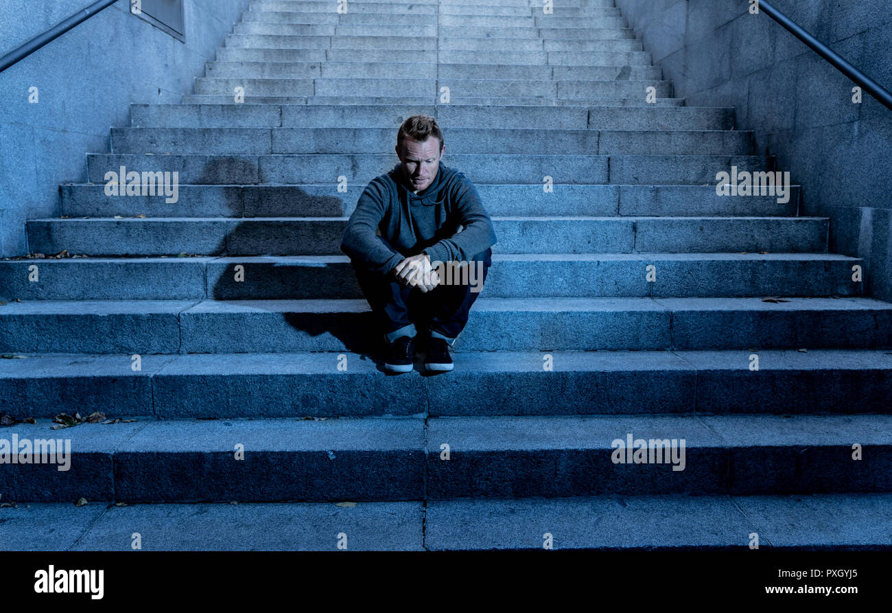 Young desperate jobless man in casual clothes abandoned lost in ...