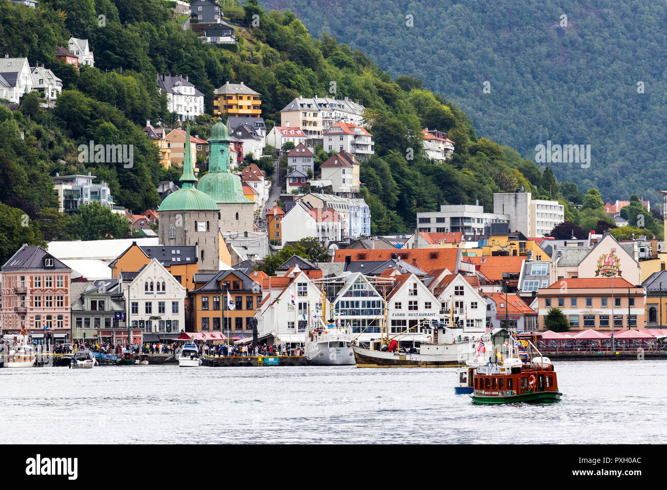 The tiny harbor ferry Beffen crossing the inner harbor of the port of ...