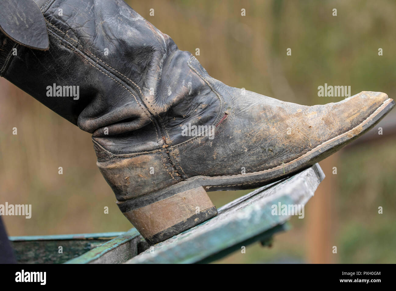Dirty wrinkled boot Stock Photo - Alamy