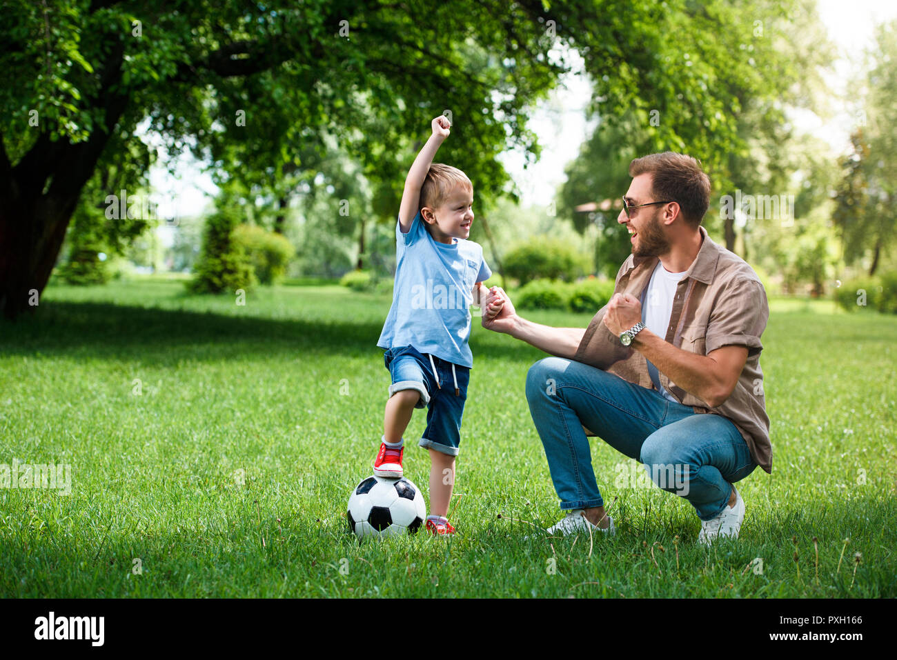 Child sign football hi-res stock photography and images - Alamy