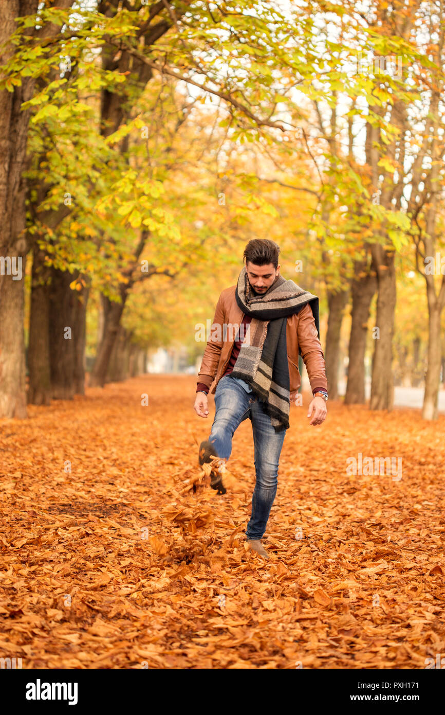Walking in park alone hi-res stock photography and images - Alamy