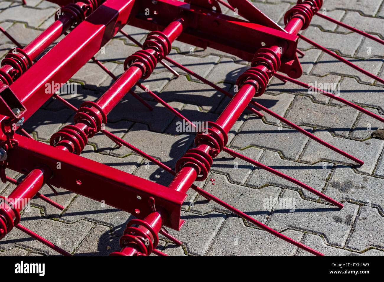 Harrows new agricultural machinery shot close up Stock Photo - Alamy