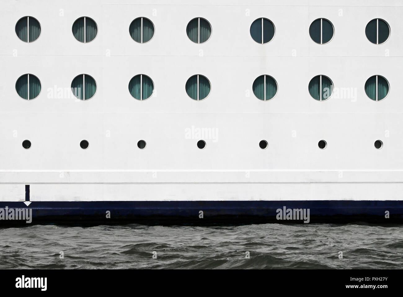 Round windows at white cruise ship side Stock Photo - Alamy