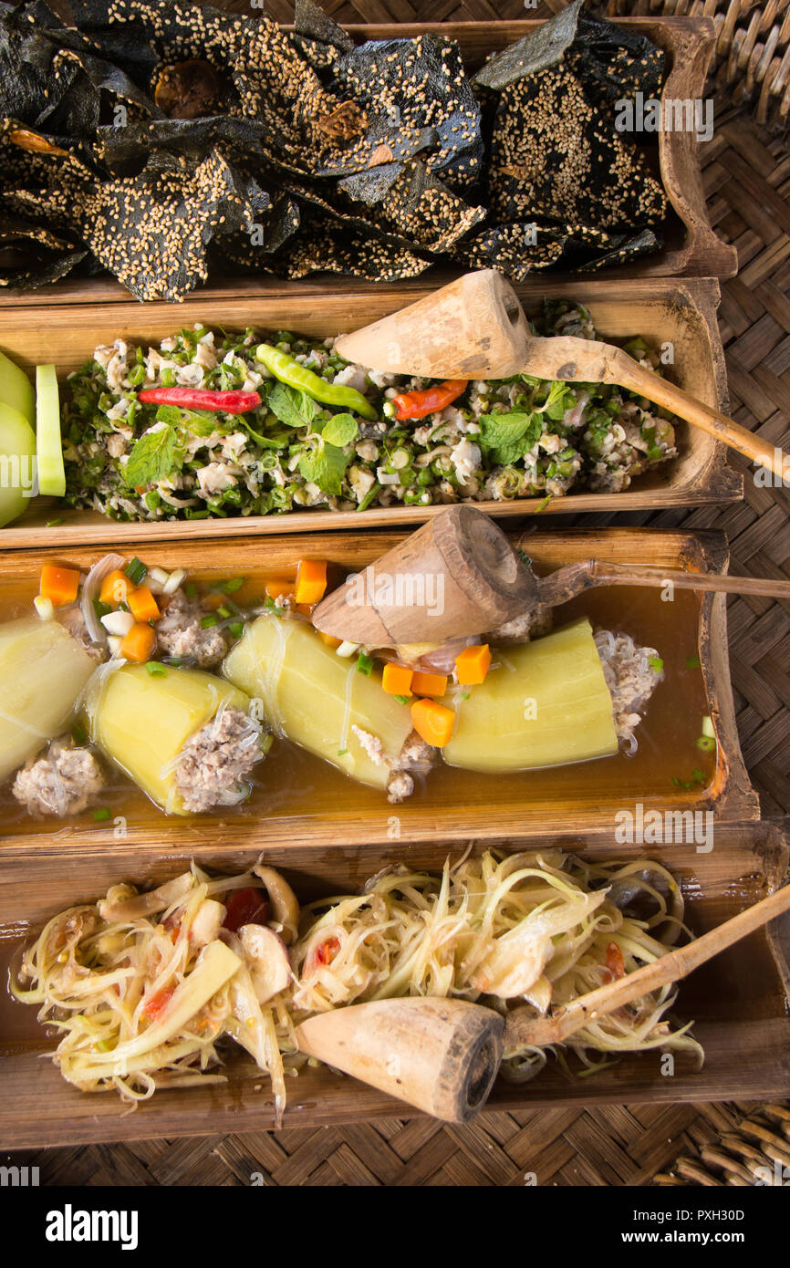 Array of typical authentic Lao Food: Seaweed Crackers (Khaipaen), Larp ...