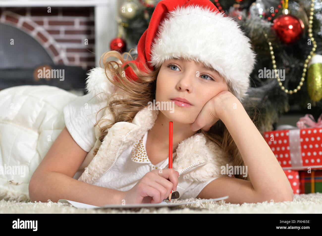 Portrait of a little girl writing letter Stock Photo - Alamy
