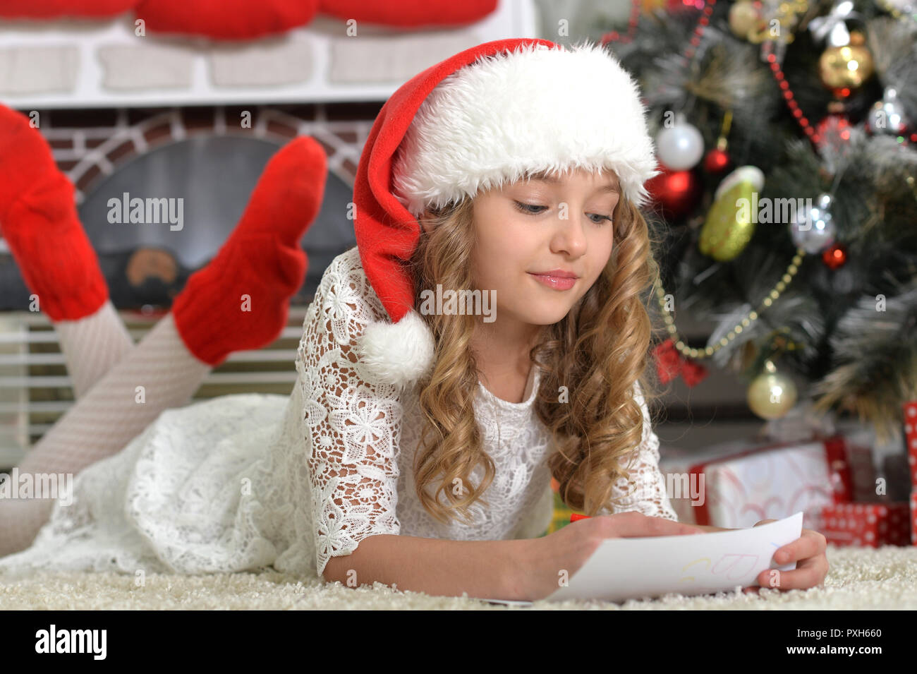 Portrait of a little girl writing letter Stock Photo - Alamy