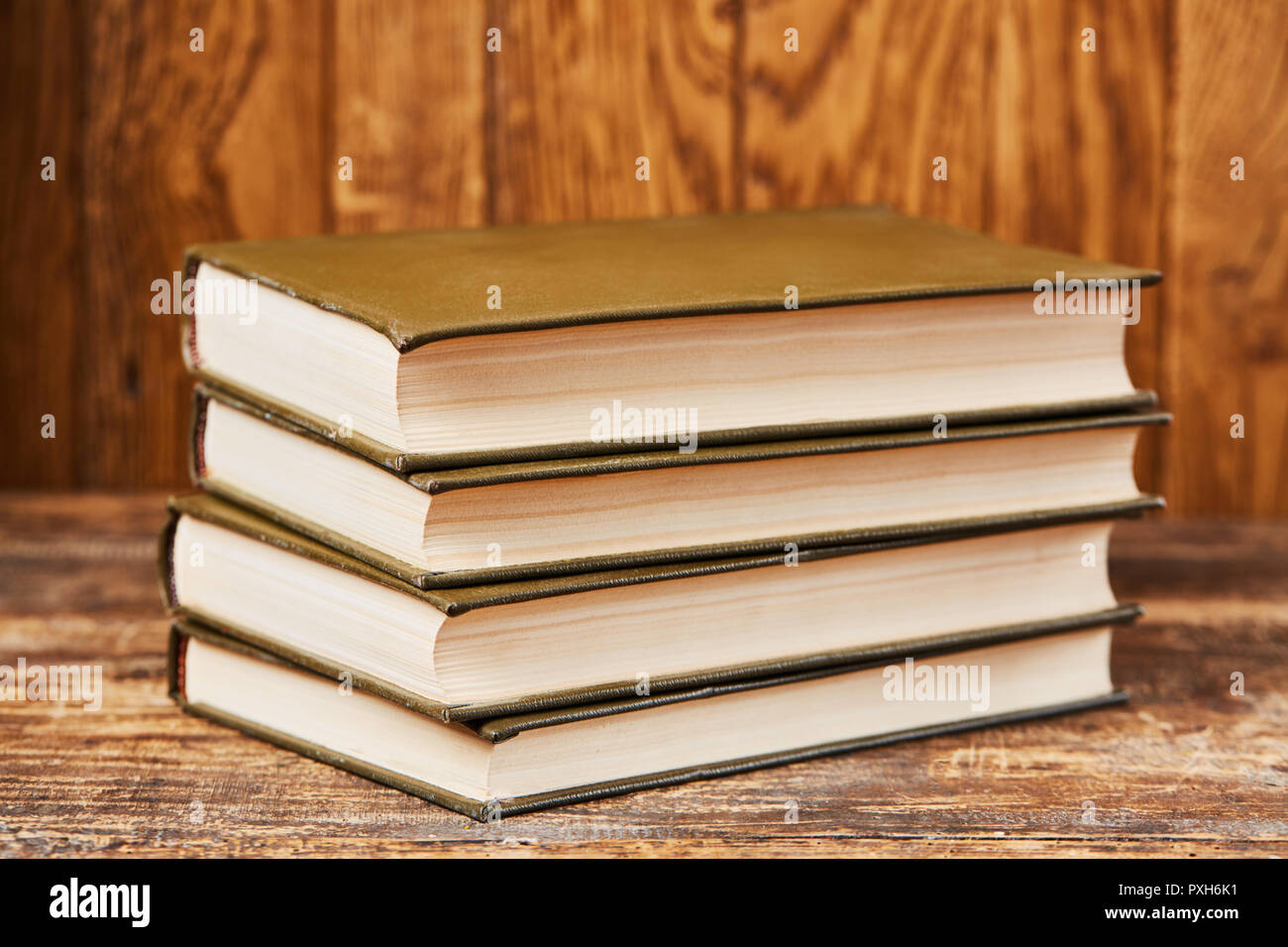A few books on the student table Stock Photo - Alamy