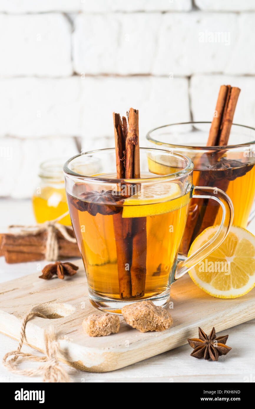 Autumn hot tea with lemon and spices Stock Photo - Alamy