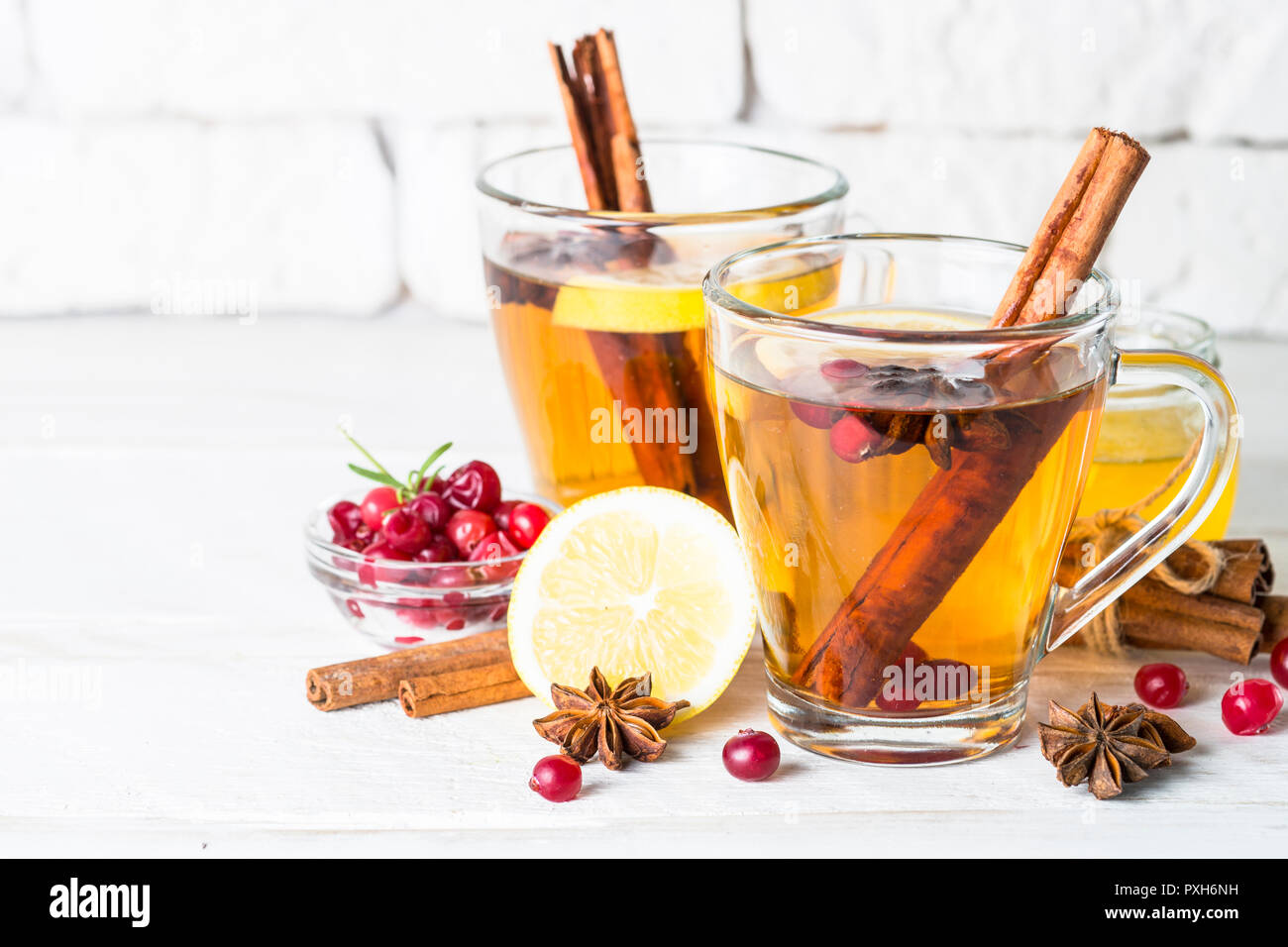 Autumn or winter hot tea with fruit, berries and spices Stock Photo - Alamy