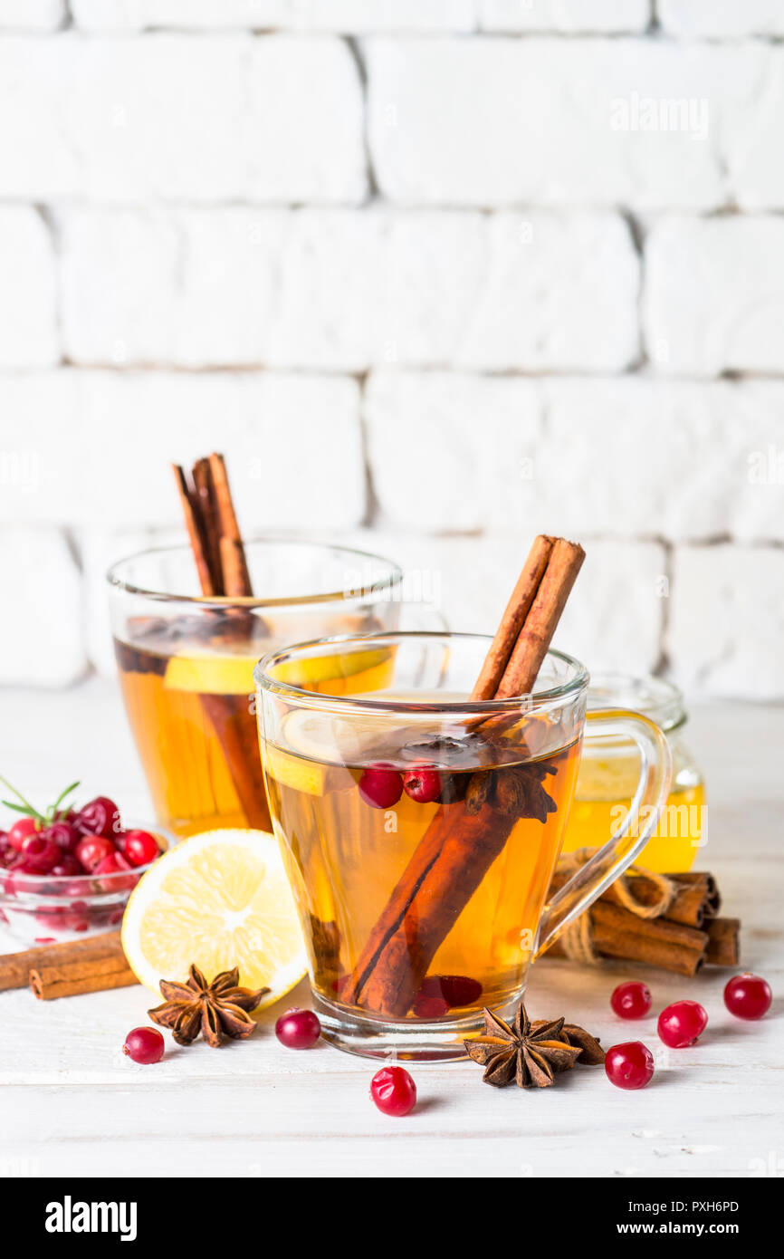 Autumn or winter hot tea with fruit, berries and spices Stock Photo - Alamy