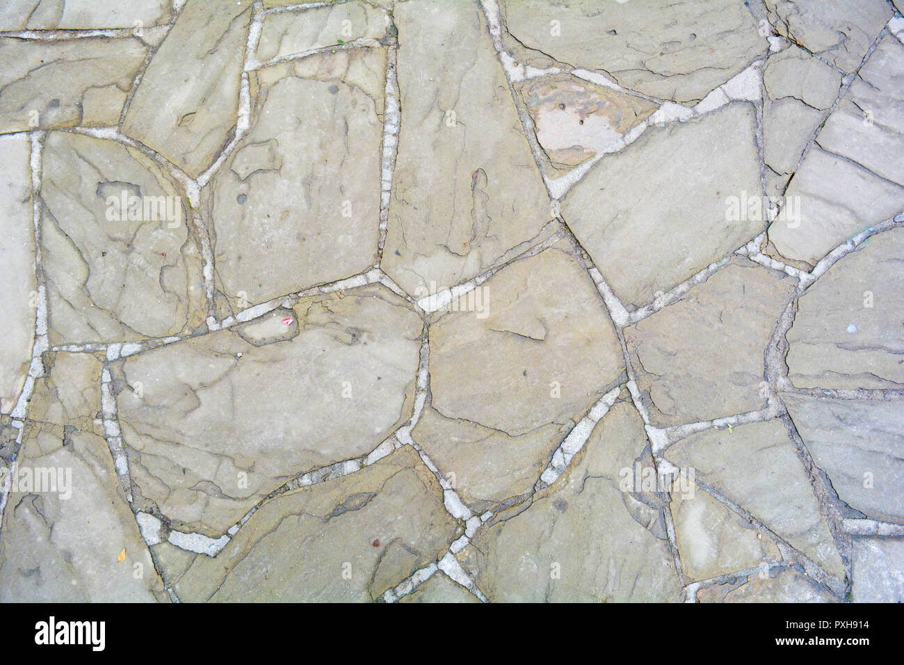 City street stone pavement. Top view on cobblestoned pavement ...