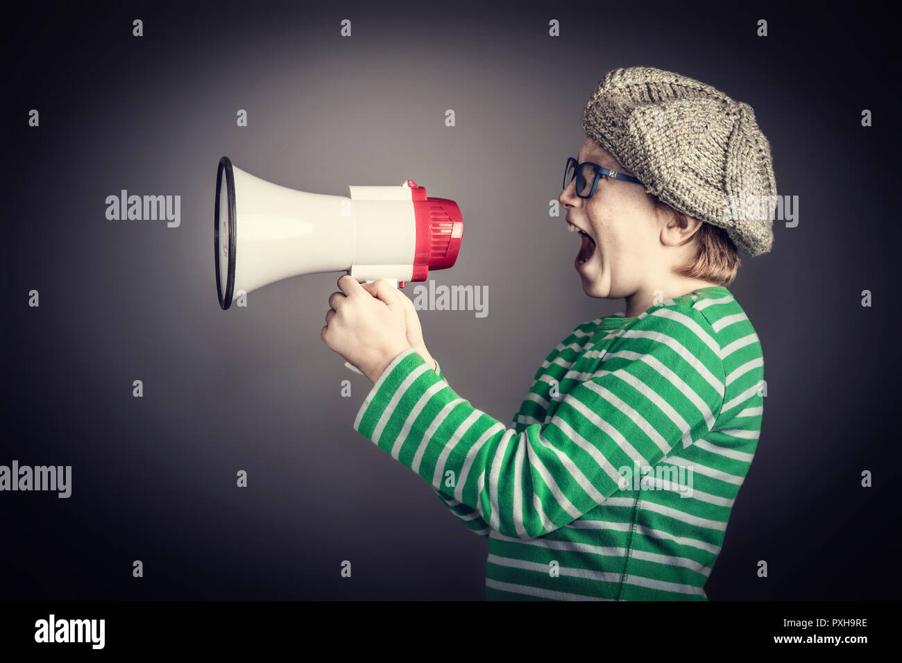 portrait of boy with megaphone Stock Photo - Alamy
