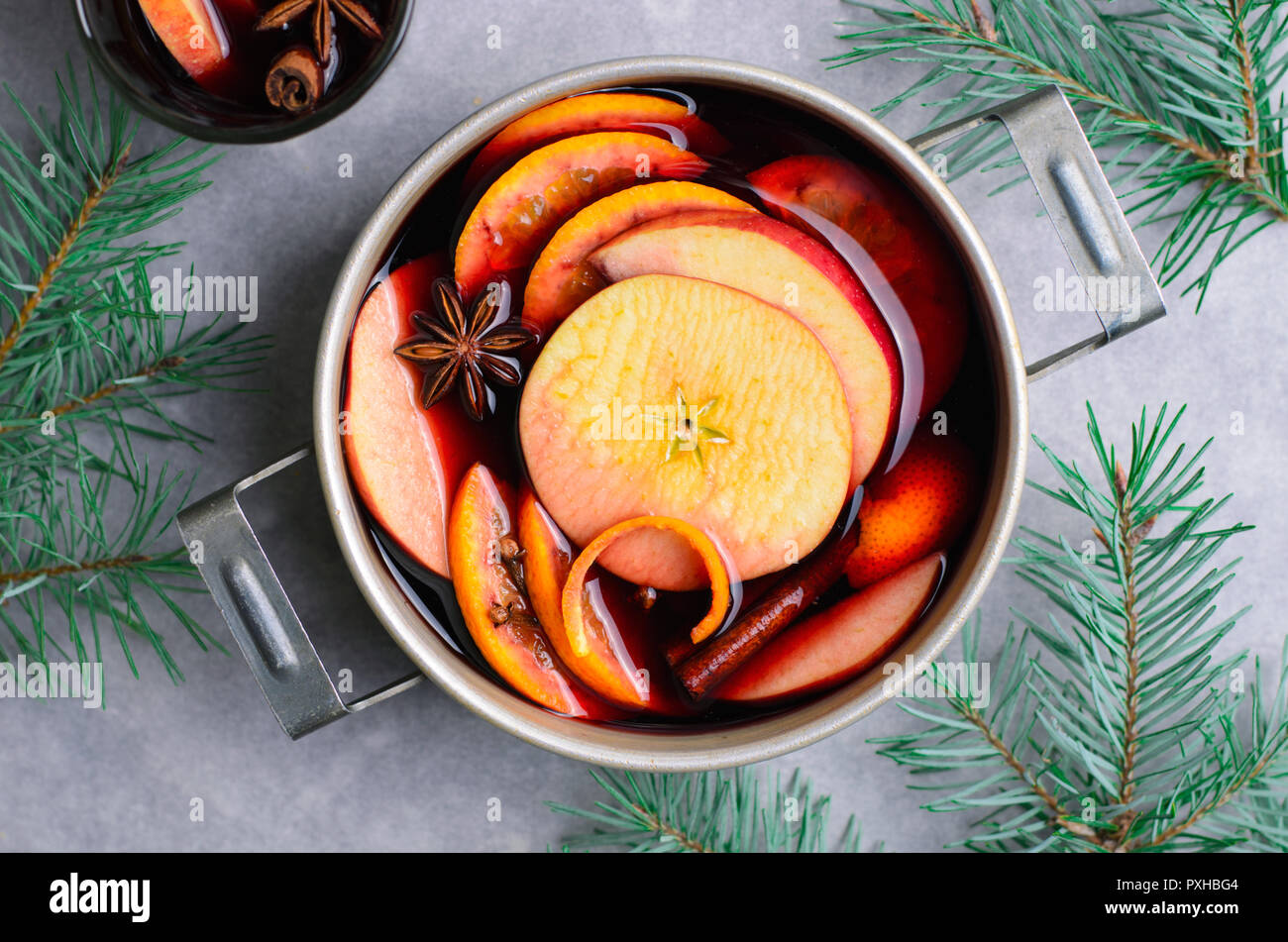 Mulled Wine, Hot Spiced Drink with Orange and Apple in a Vintage Pot ...