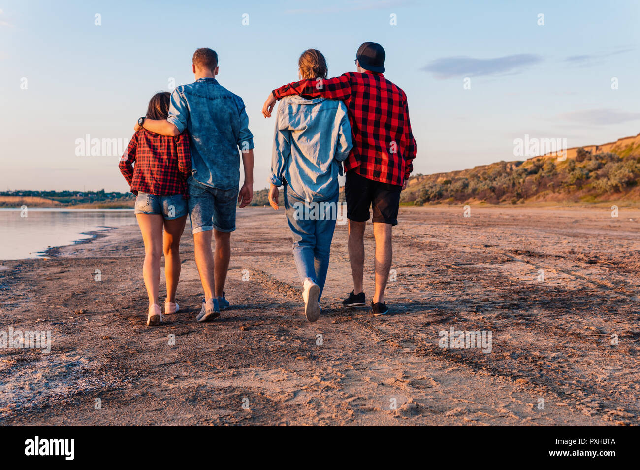 Women walking together on the beach hi-res stock photography and images ...