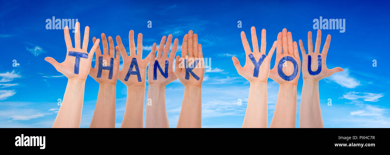 Many Hands Building Word Thank You, Blue Sky Stock Photo - Alamy