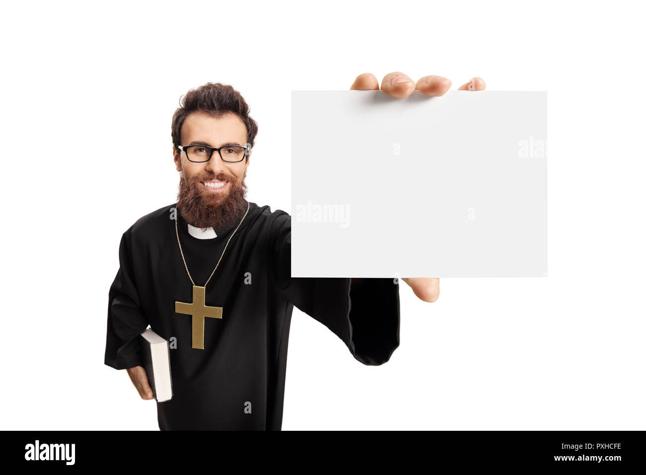 Catholic priest holding holy bible hi-res stock photography and images ...