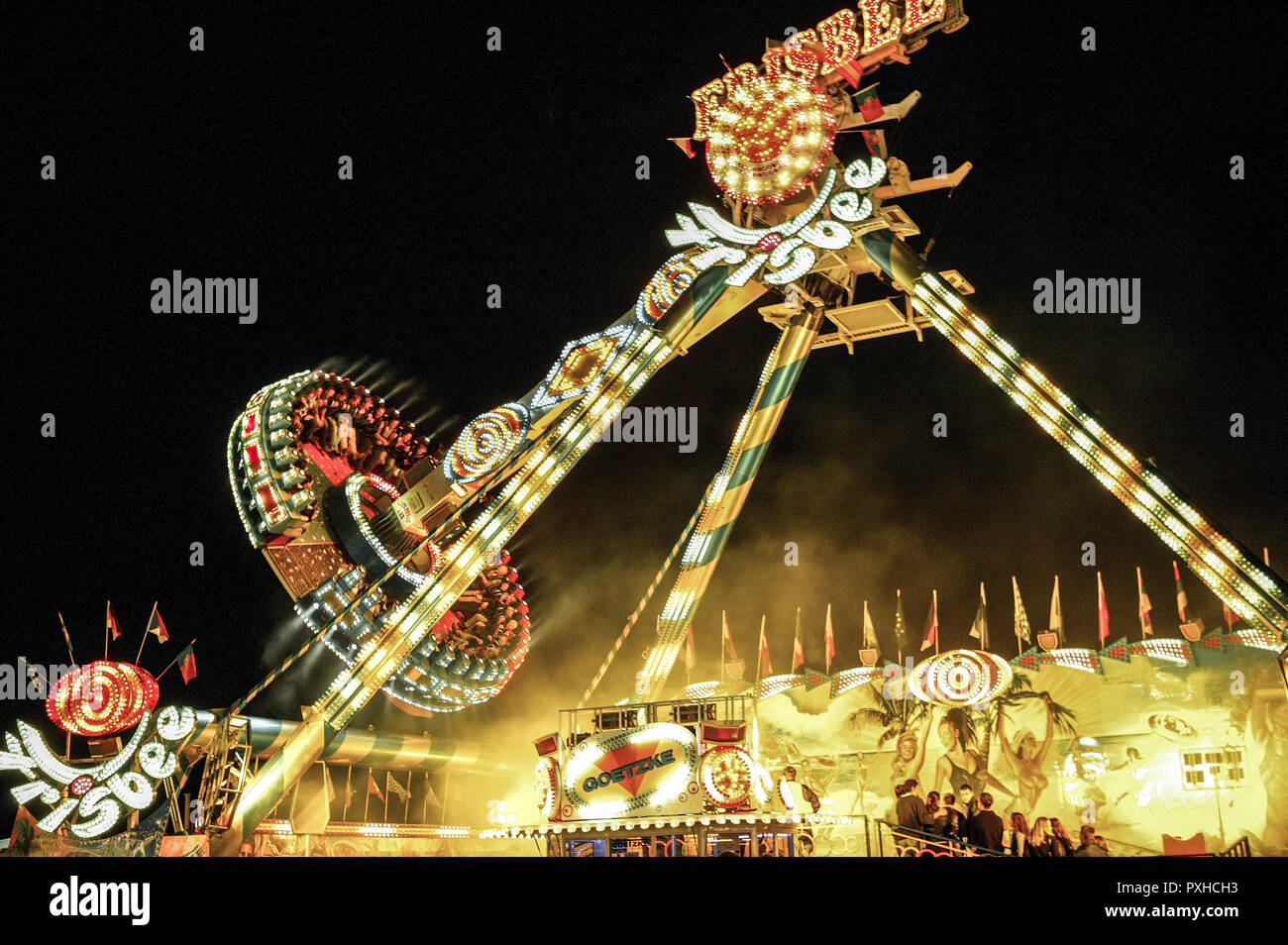 Oktoberfest in Munich at night Stock Photo - Alamy