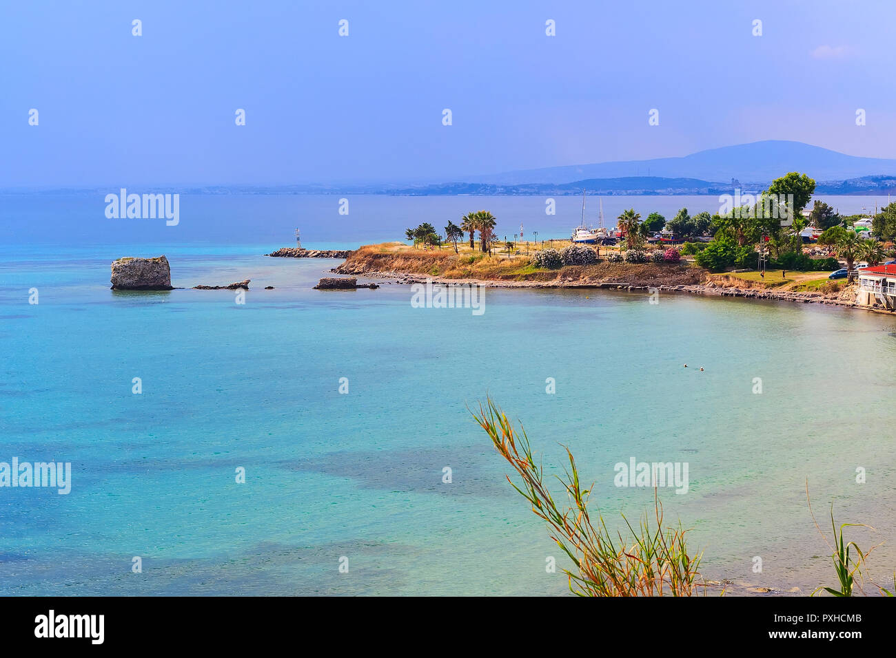 turquoise sea bay and old port of Nea Potidea or Nea Poteidea in ...