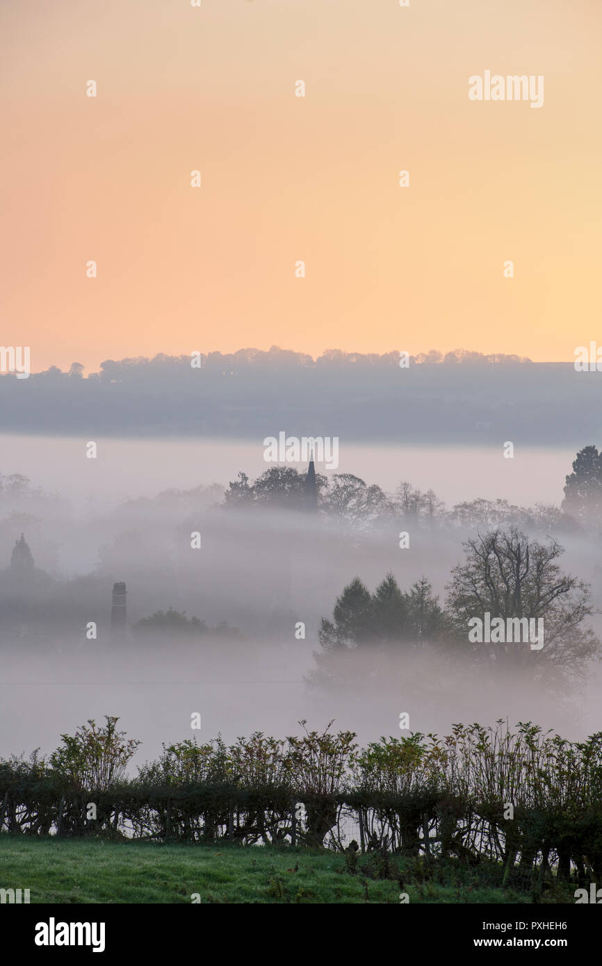 Fog over cotswold village hi-res stock photography and images - Alamy