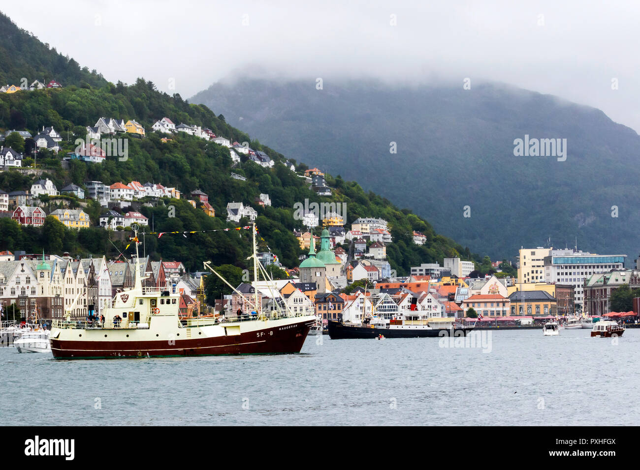 Old ocean fishing vessel Haugefisk, built 1978. Arriving in the port of ...