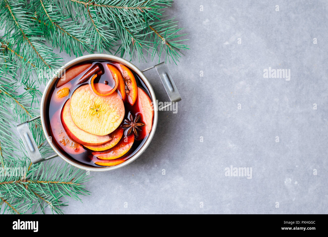Mulled Wine, Hot Spiced Drink with Orange and Apple in a Vintage Pot ...