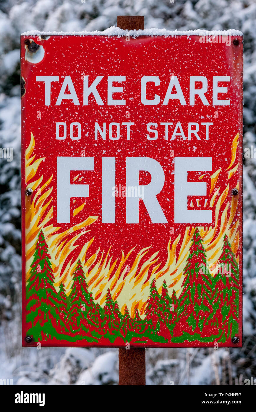 Take care Do not start Fire sign in the snow Stock Photo - Alamy