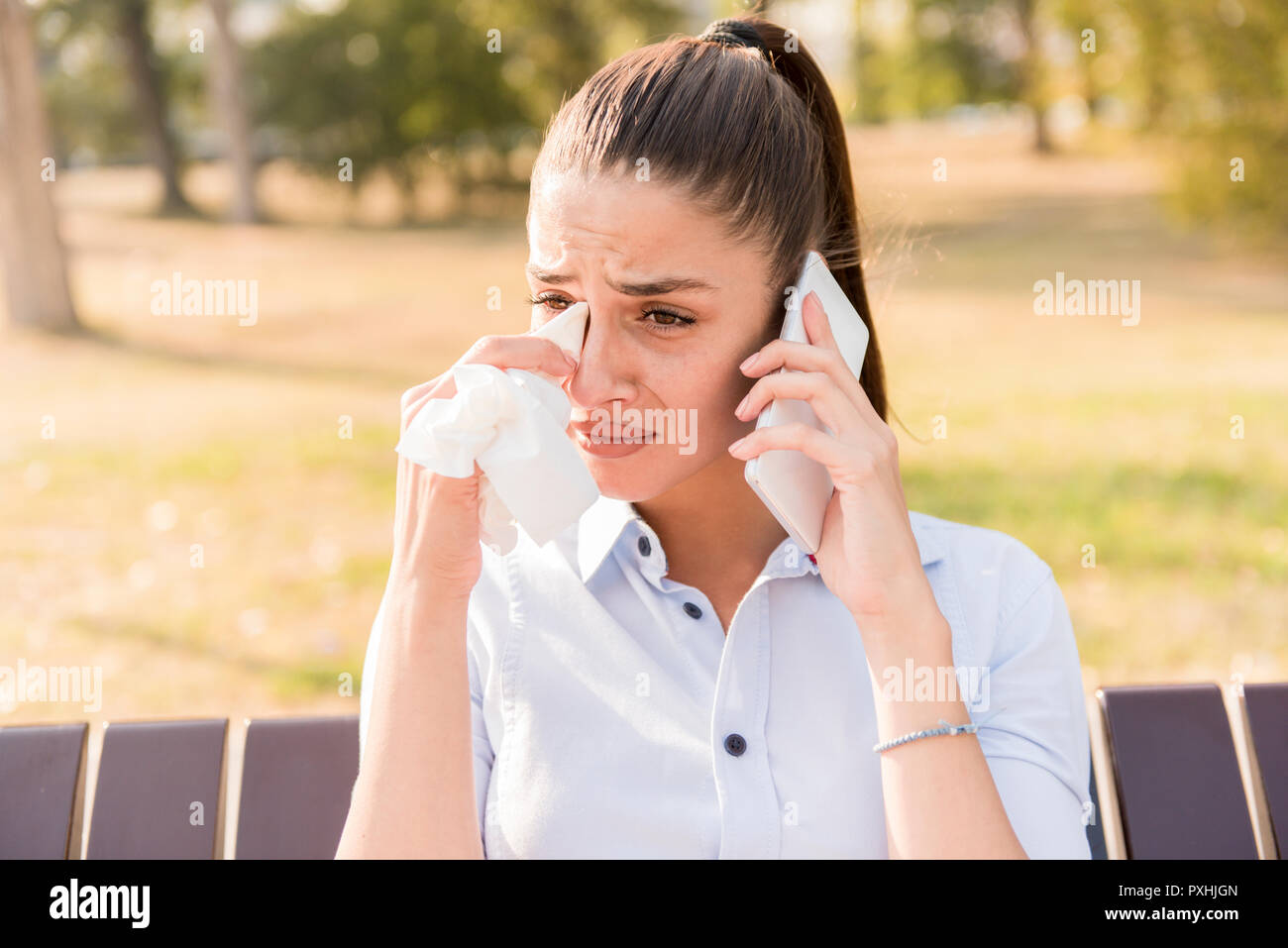 Mobile phone sad pain hi-res stock photography and images - Alamy