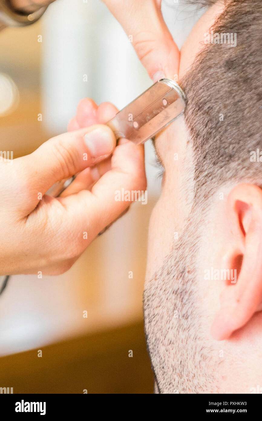 Barber shaving mans head hi-res stock photography and images - Alamy