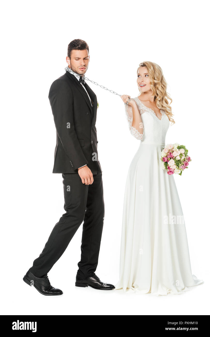beautiful young bride with chain and leashed unhappy groom isolated on ...