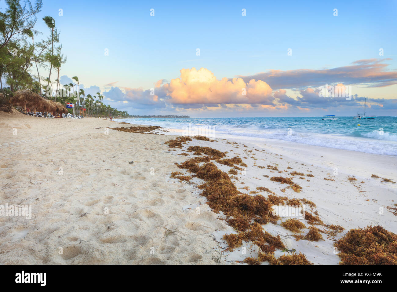 Vacation in Dominican Republic. Sunset sandy beach Stock Photo - Alamy