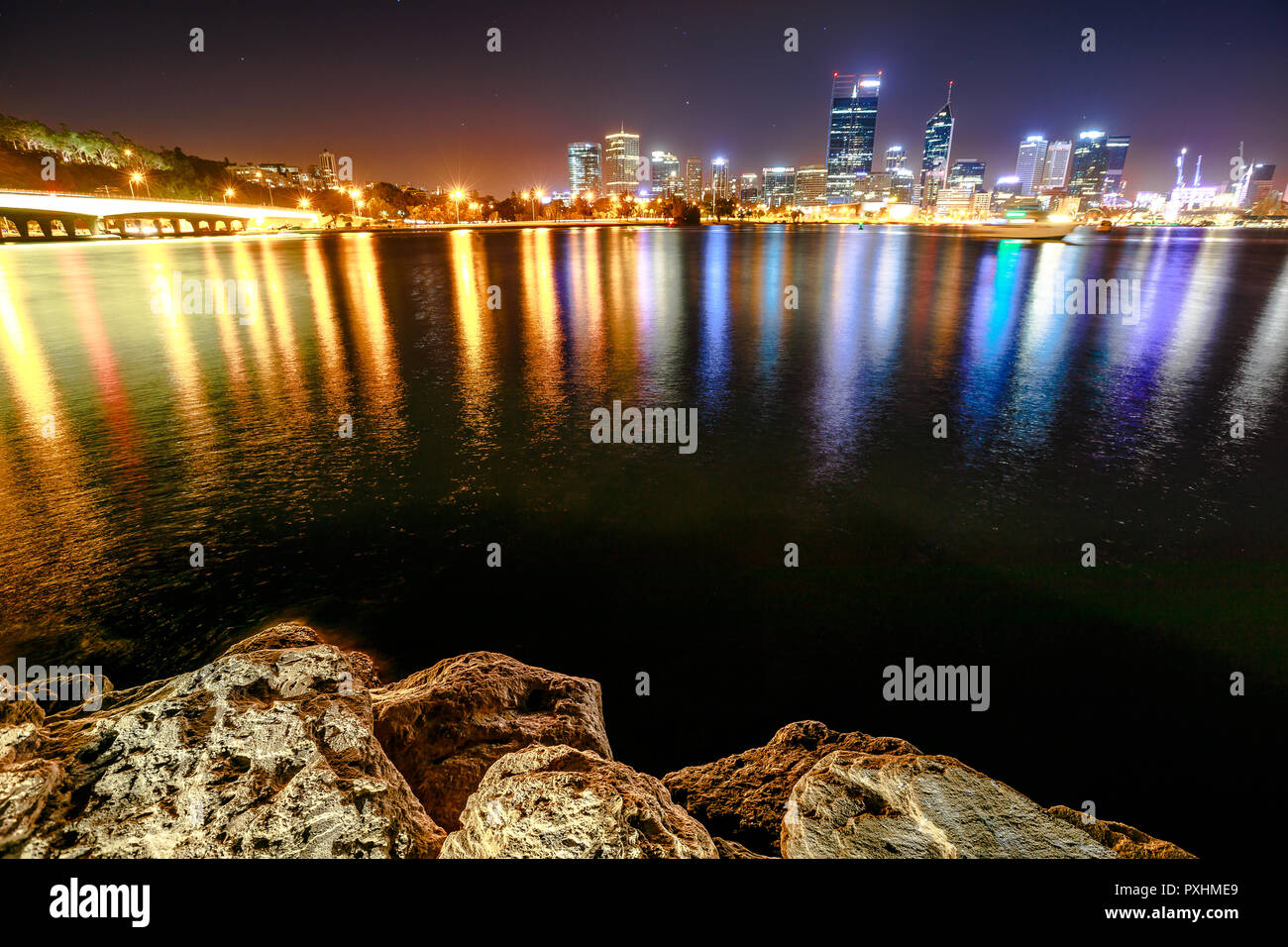 Narrows Bridge and Perth Skyline illuminated at night. Perth Downtown ...