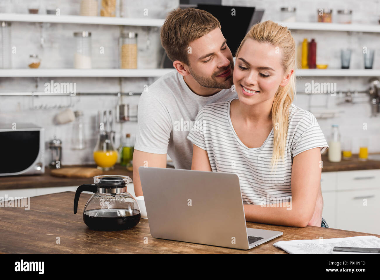 Cuddling work hi-res stock photography and images - Alamy