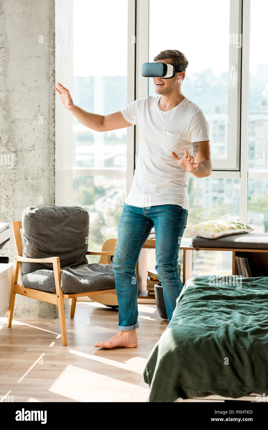 emotional young man in vr headset at home Stock Photo - Alamy