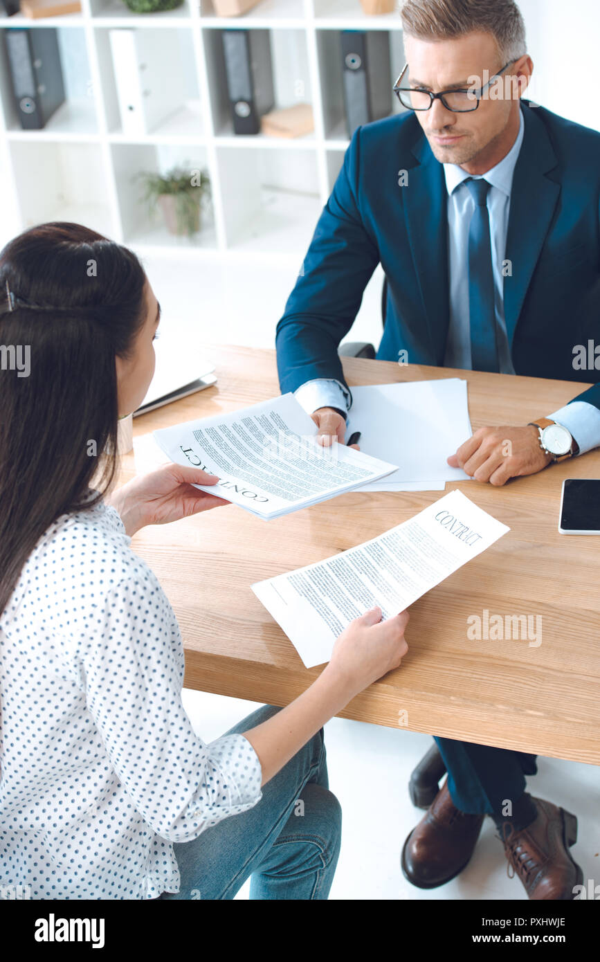 Lawyer and client discussing contract hi-res stock photography and ...