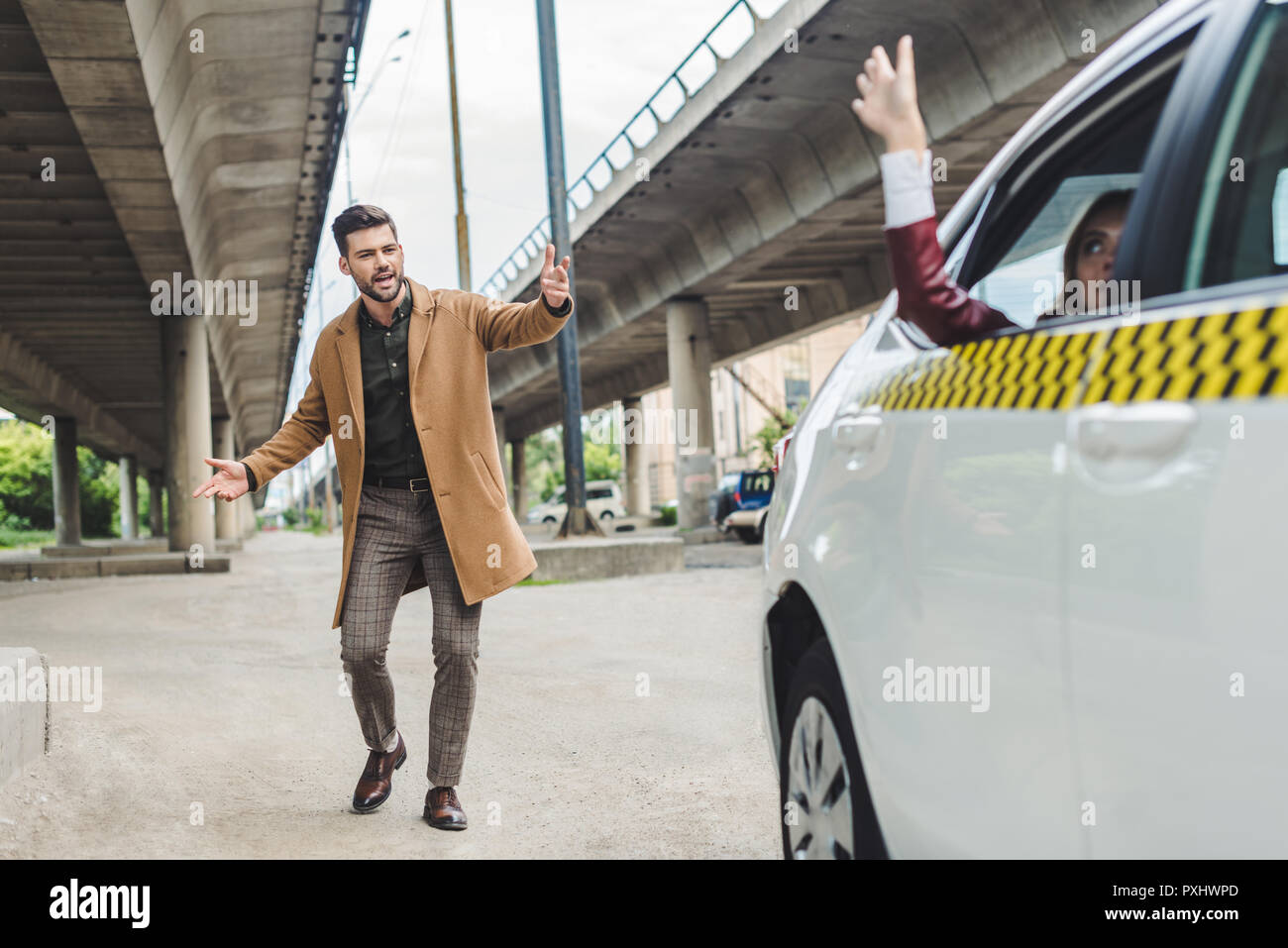 Running man and woman car hi-res stock photography and images - Alamy