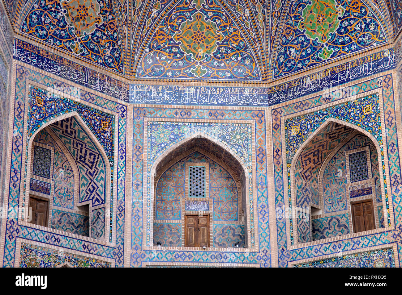 Details of colorful mosaic tiles on exterior of madrasa at The Registan ...