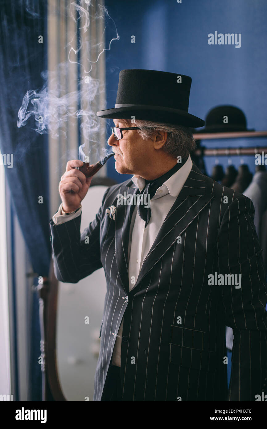 Portrait of posh mature gentleman visiting a tailor's shop Stock Photo ...