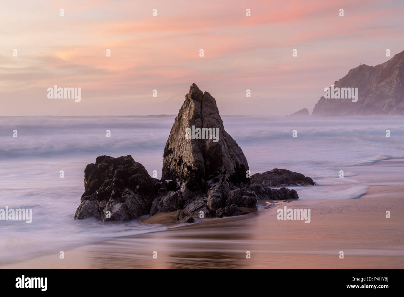 Coastal rock stack Sunset at Gray Whale Cove State Beach Stock Photo ...