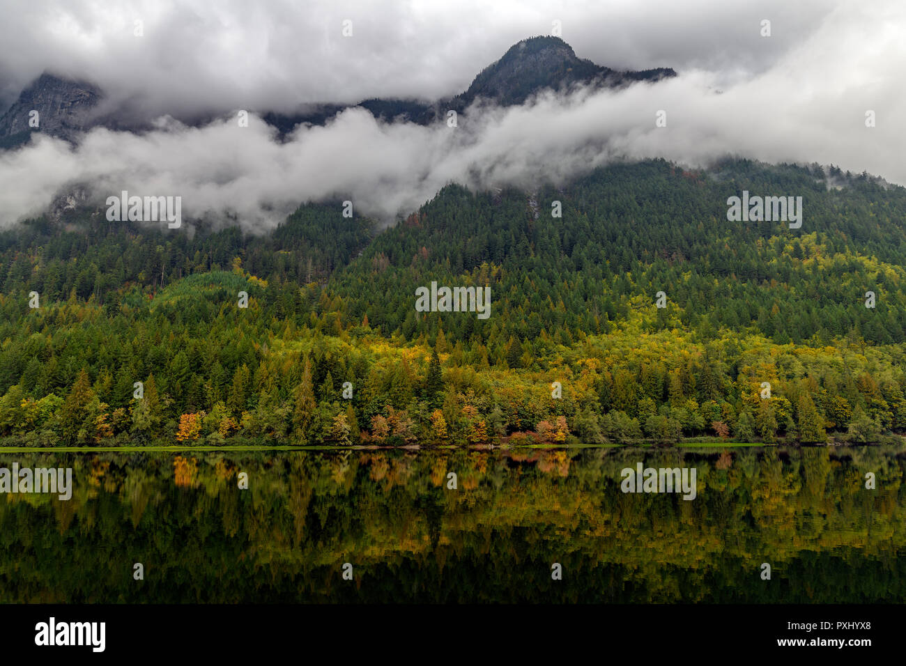 The Silver Lake in the early fall colors with dramatic clouds on the ...