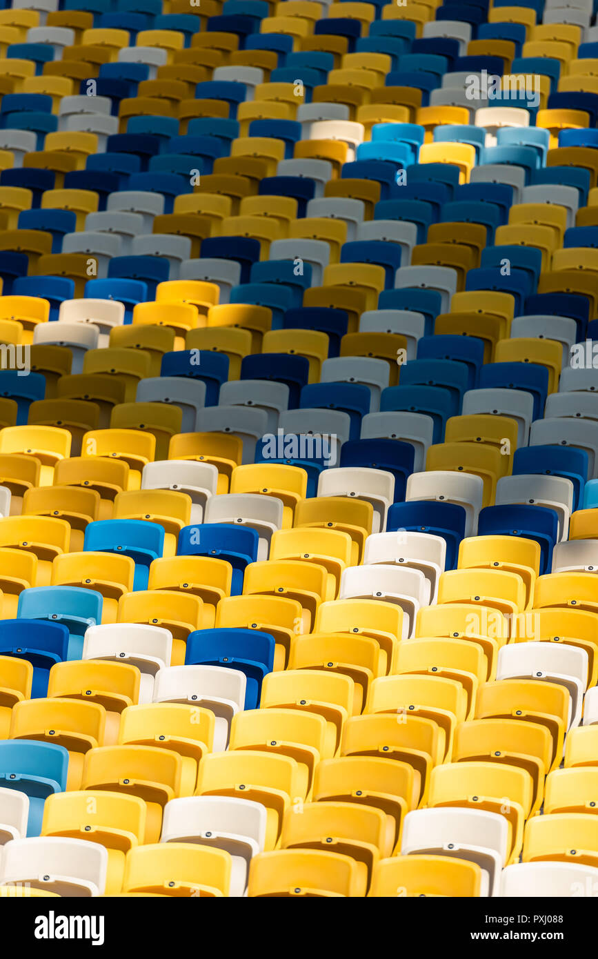 full frame shot of empty colorful seats on tribunes of stadium Stock ...